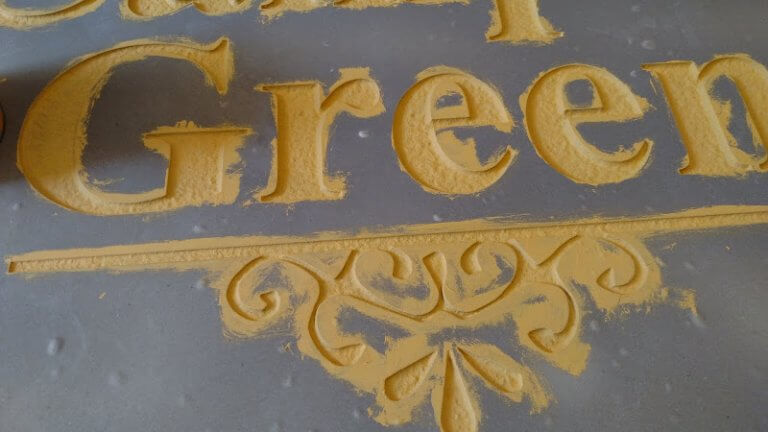 Carved Granite Sign with Gold Leaf, at Campus Green. - Designs & Signs